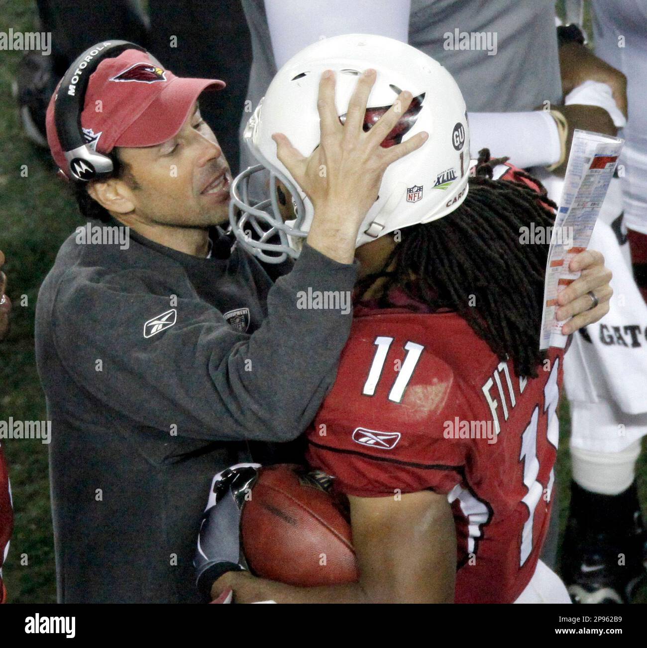 Arizona Cardinals wide receiver Larry Fitzgerald (11) talks with ...