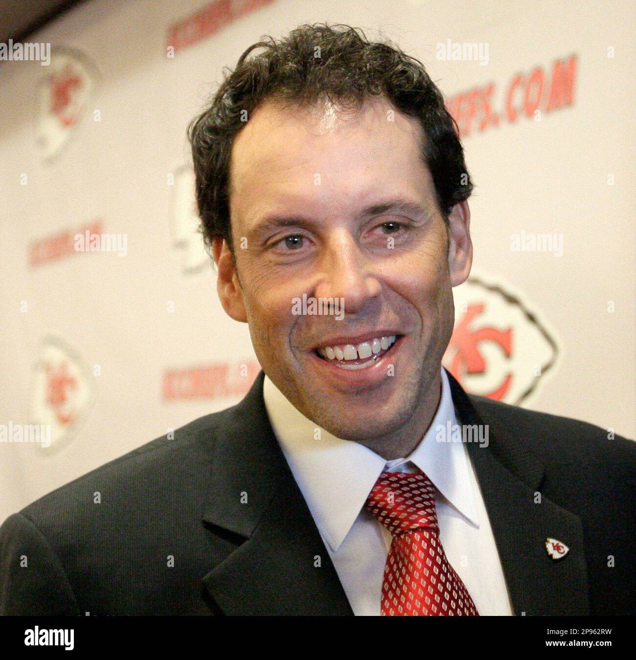 New Kansas City Chiefs head coach Todd Haley smiles as he walks off the ...