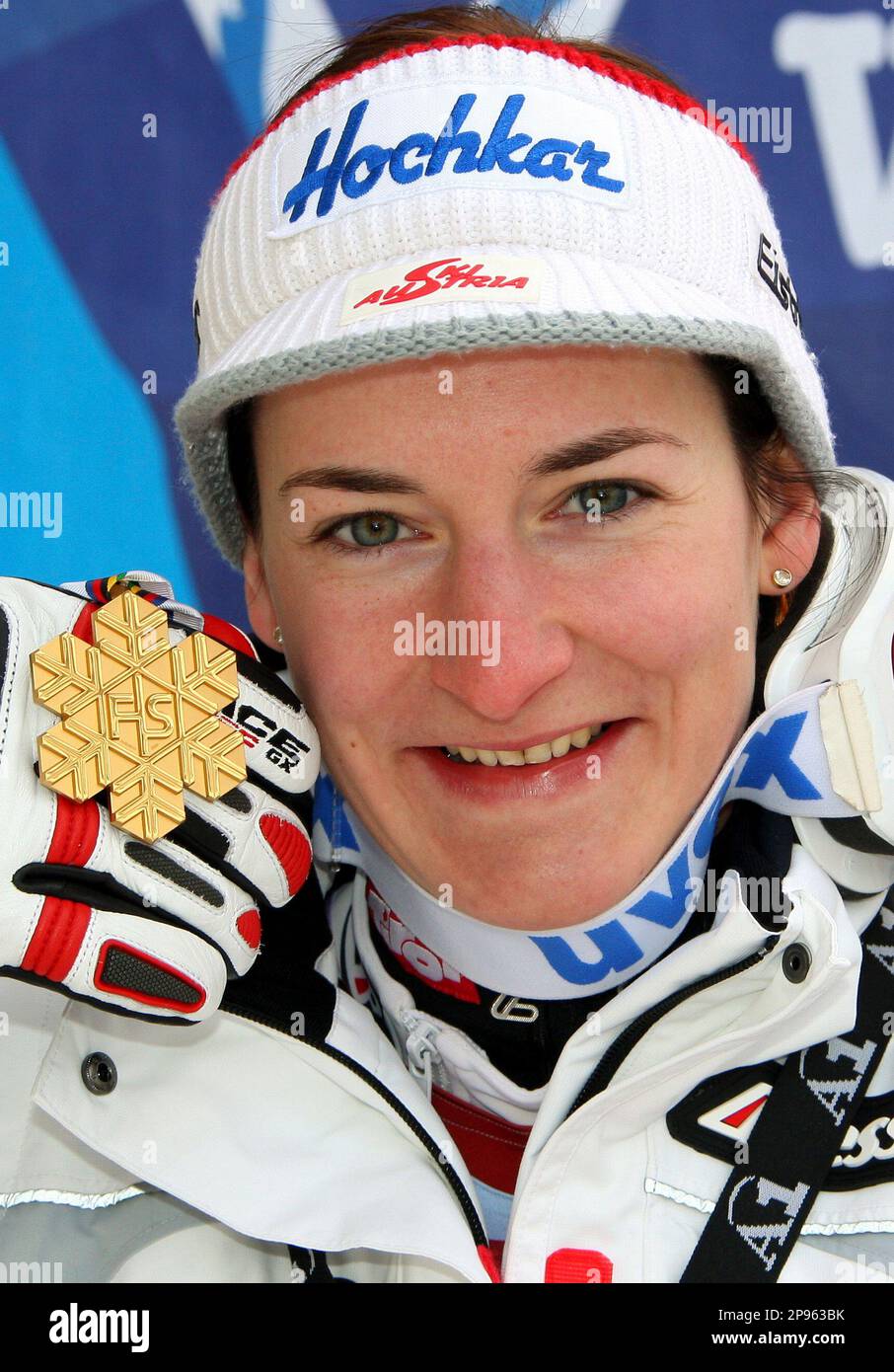 Austria's Kathrin Zettel shows the gold medal of the women's Super ...