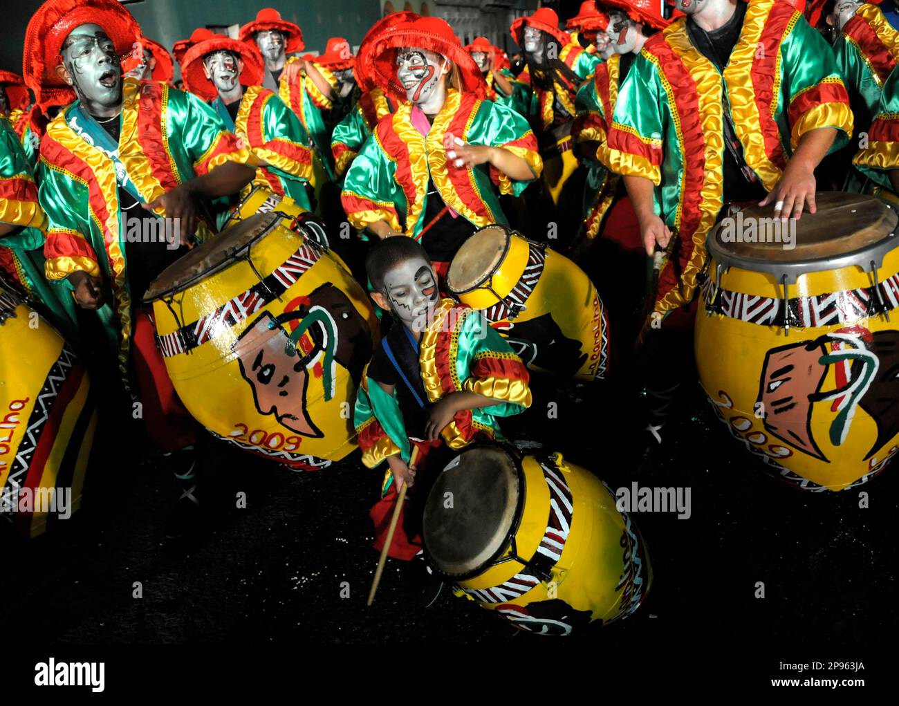 Drummers perform during "Las Llamadas" carnival parade in Montevideo ...