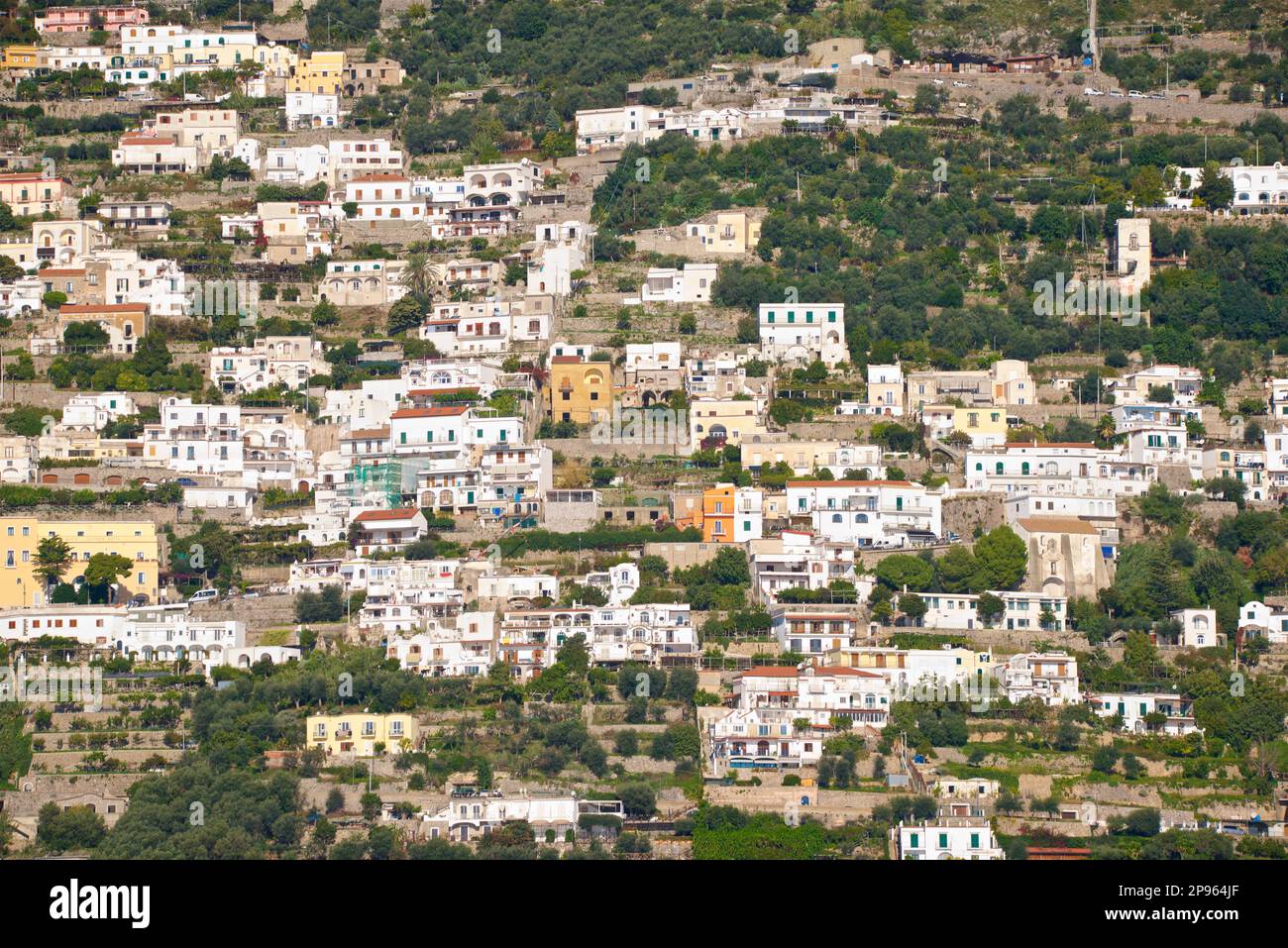 Views of the Amalfi coast with scattered housing and hotels seen from a ...