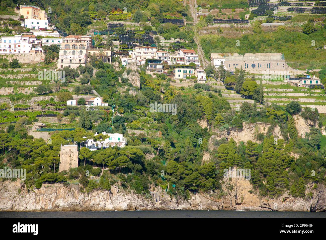 Views of the Amalfi coast with scattered housing and hotels seen from a ...