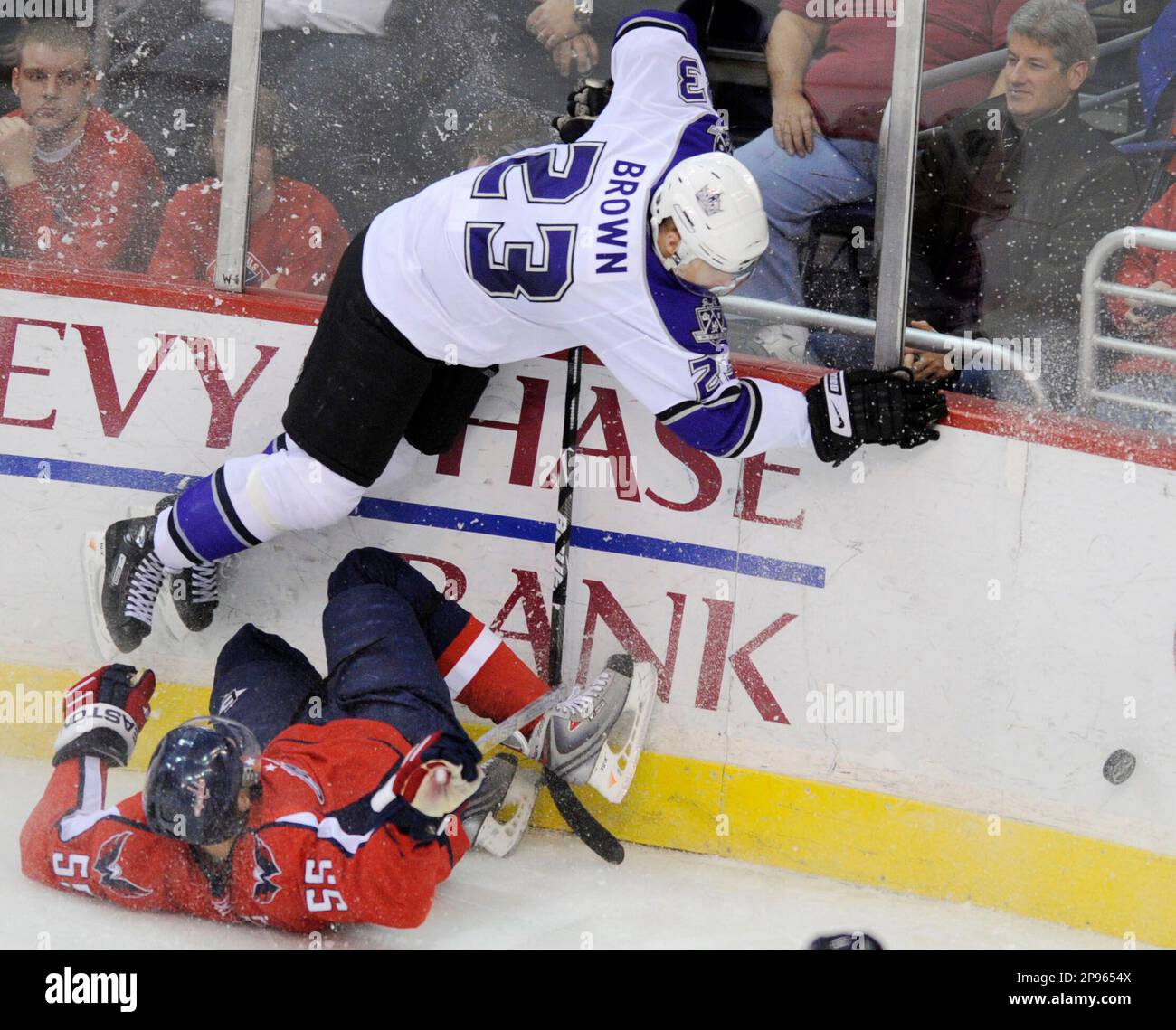 Los Angeles Kings' Dustin Brown (23) is upended by Washington Capitals ...