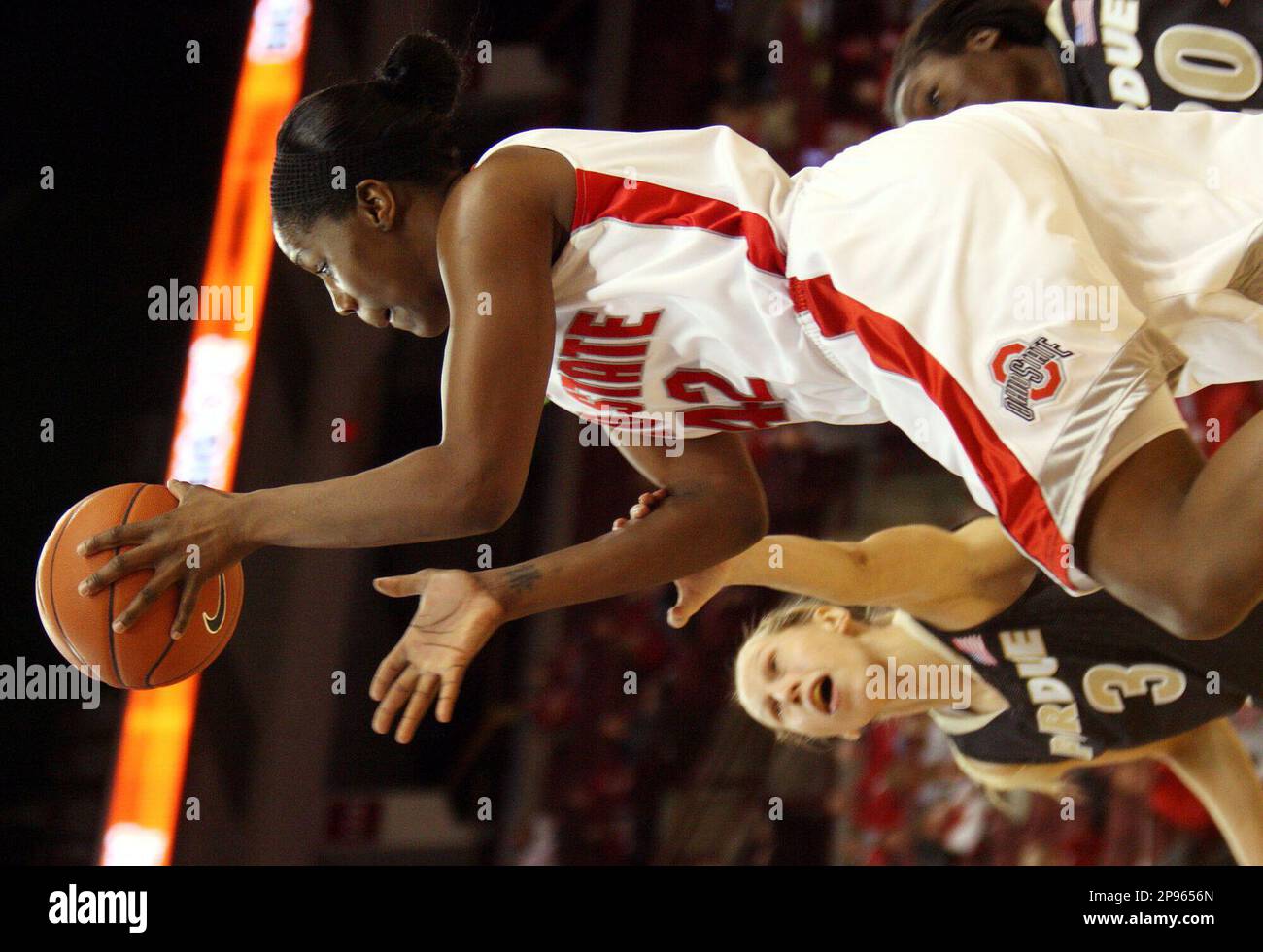 Ohio State's Jantel Lavender (42) drives to the basket as Purdue's ...