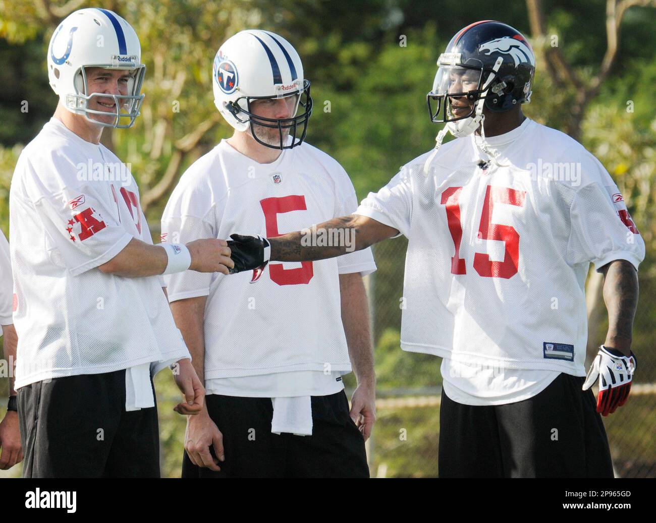 Indianapolis Colts quarterback Peyton Manning, left, greets Denver ...