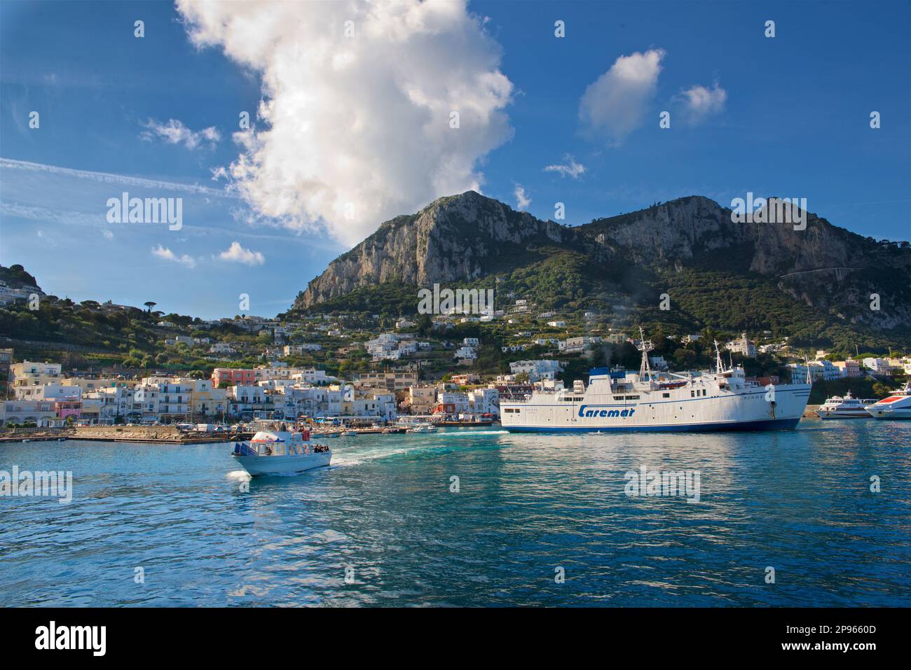 Approaching Capri harbour by boat. Capri is an island located in the ...