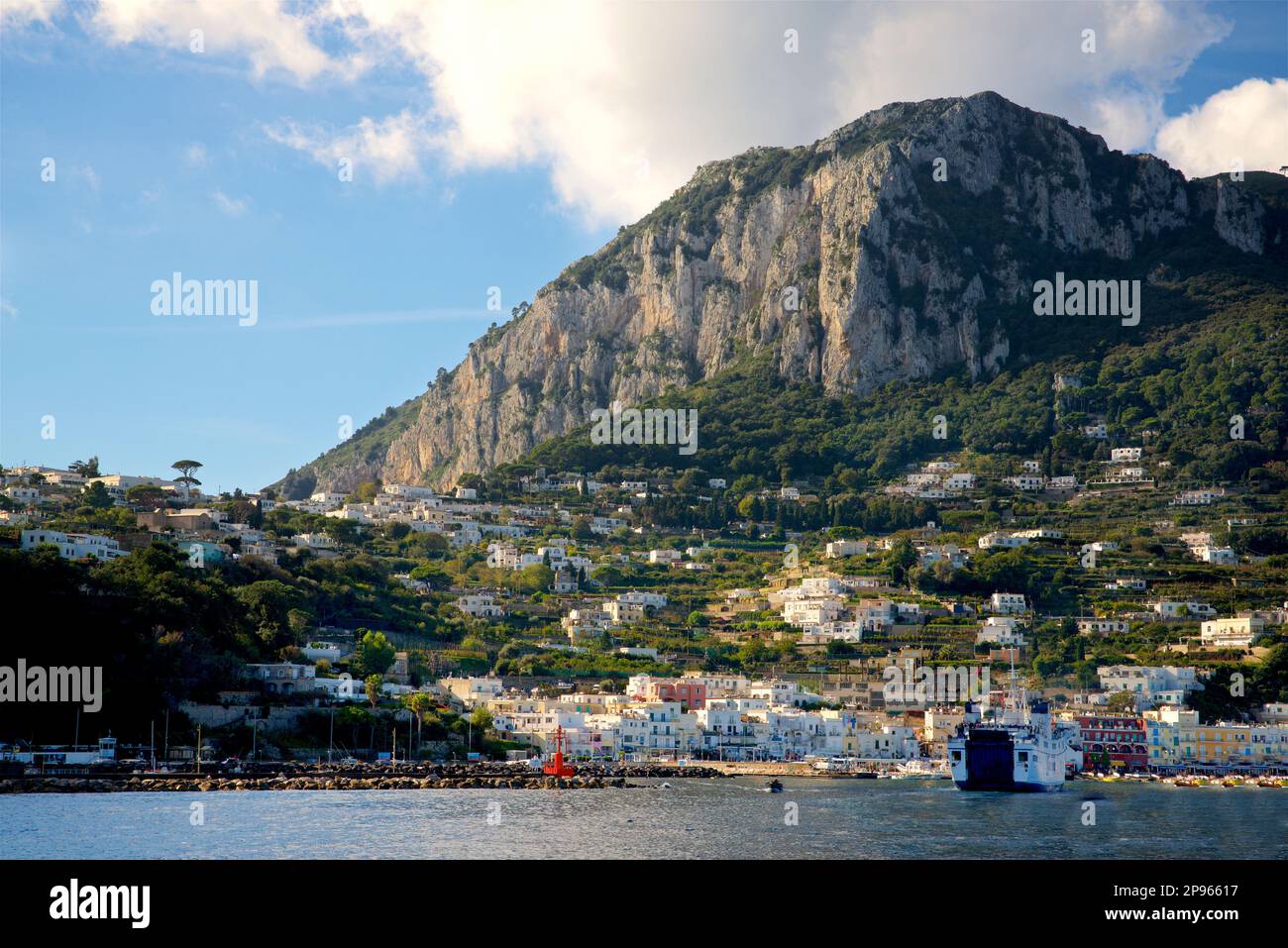 Approaching Capri harbour by boat. Capri is an island located in the ...