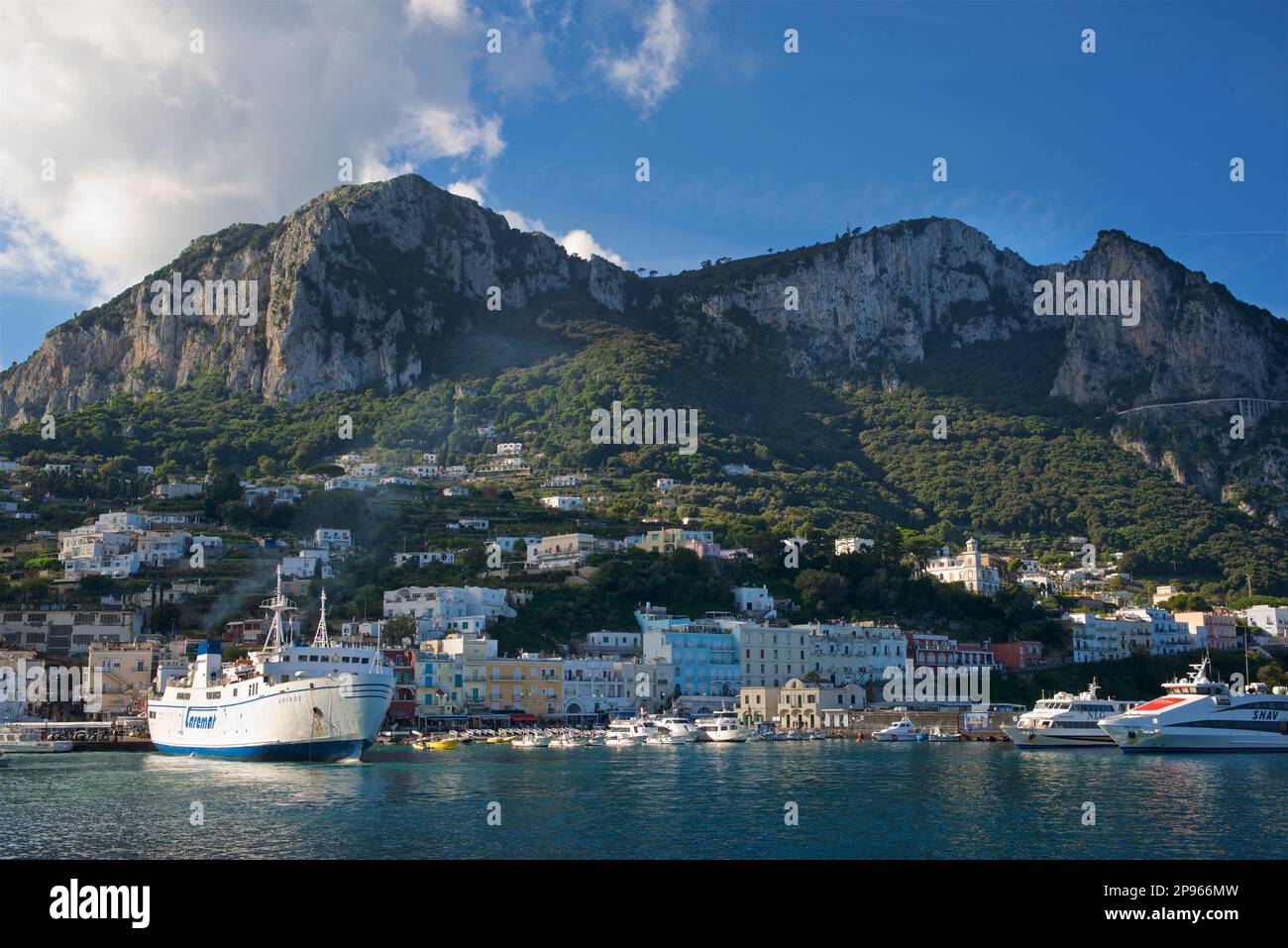 Approaching Capri harbour by boat. Capri is an island located in the ...