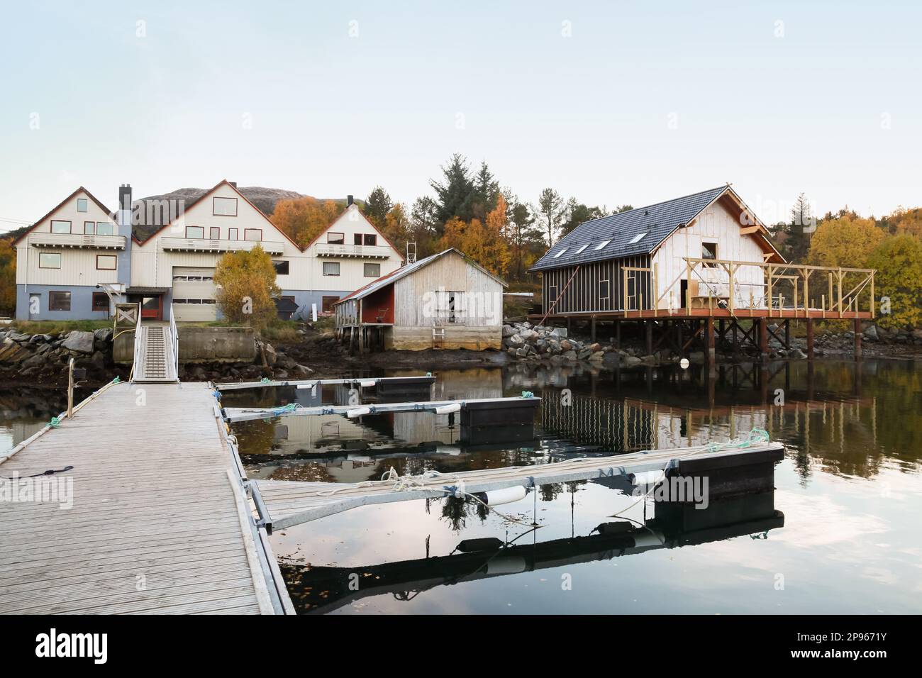 Norwegian fishing village, coastal view with wooden houses and barns ...