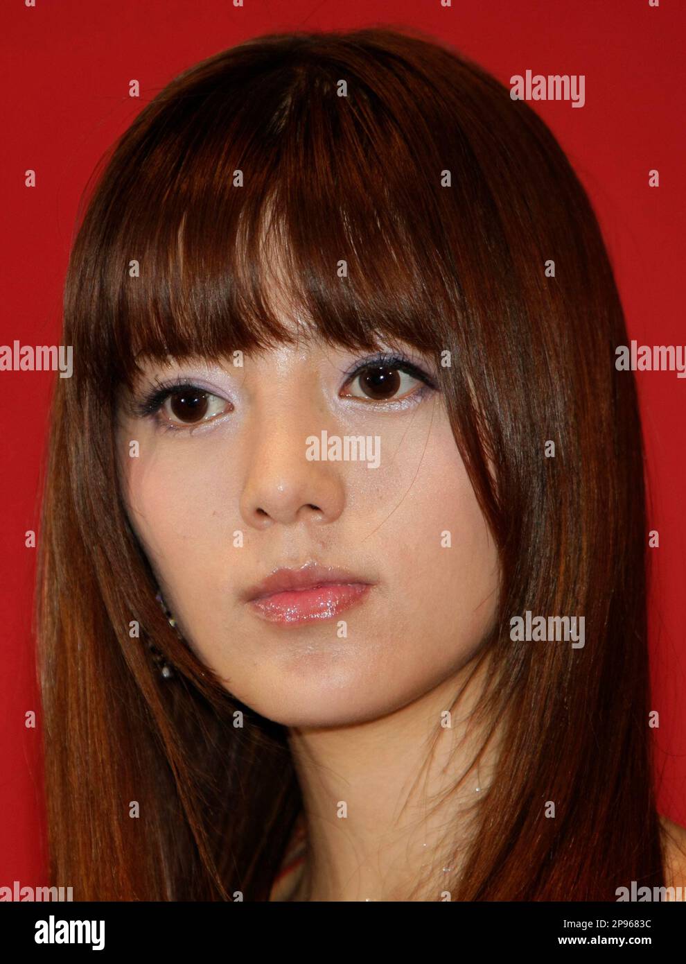 Chinese singer A Lan poses for photographers during Japan premiere of ...