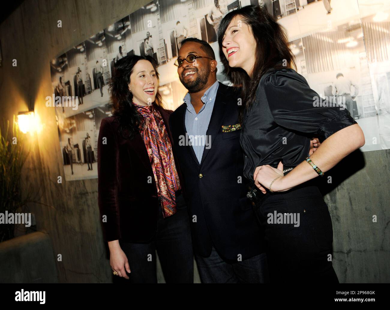 Legendary jazz trumpeter Miles Davis's son Erin Davis, center, poses ...