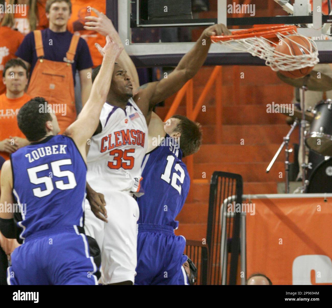 Clemson's Trevor Booker (35) dunks as Duke's Brian Zoubek (55) and Kyle ...