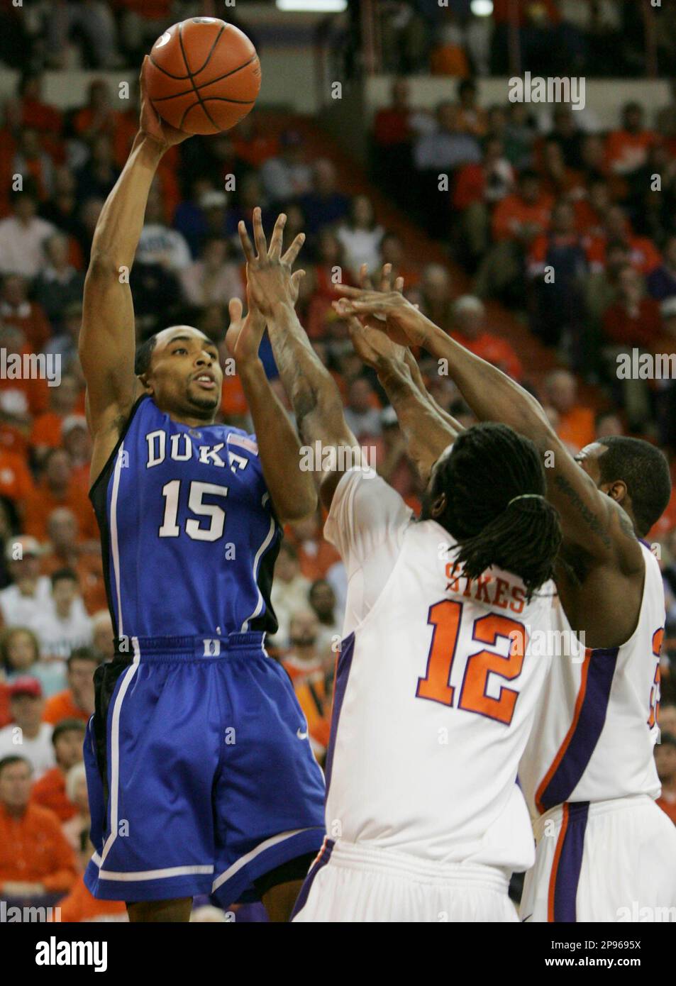 Duke's Gerald Henderson (15) shoots over Clemson's Raymond Sykes (12 ...
