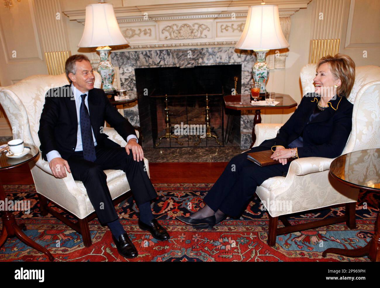 Secretary of State Hillary Rodham Clinton, right, talks with Tony Blair ...