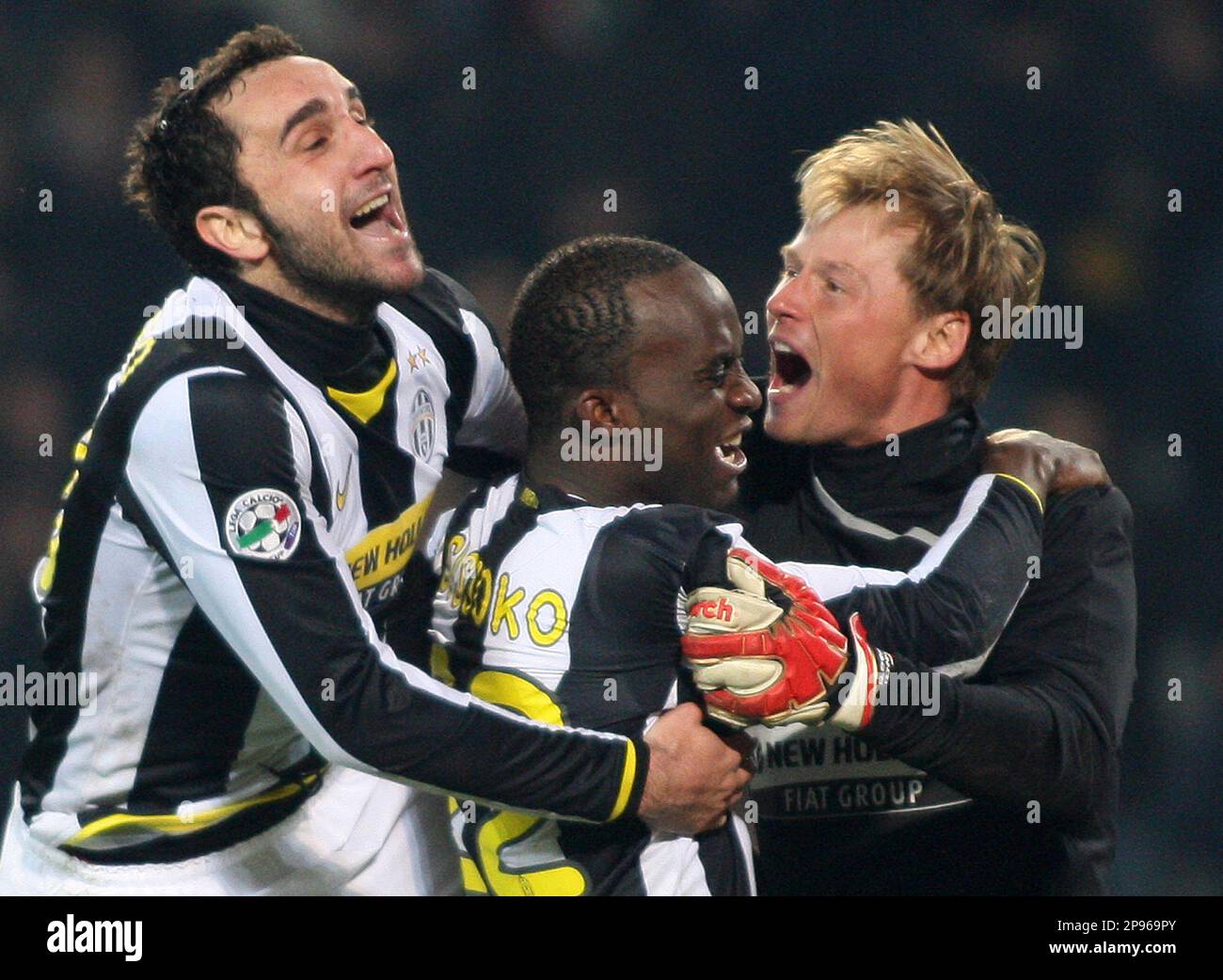 Juventus defender Cristian Molinaro, left, celebrates with his ...