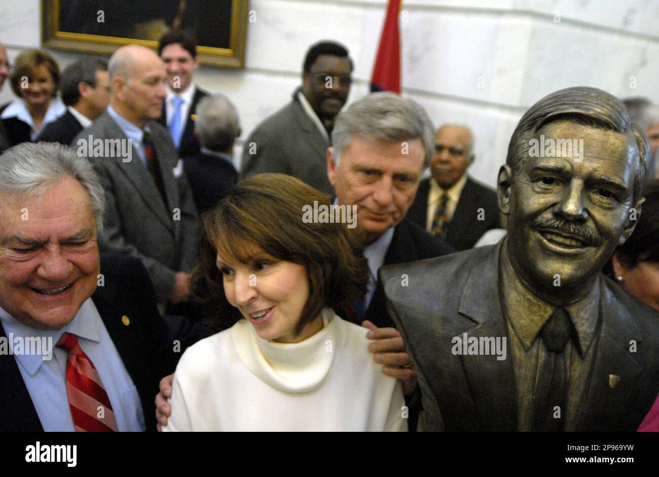 A new bronze bust of the late Arkansas Lt. Gov. Win Rockefeller, right ...