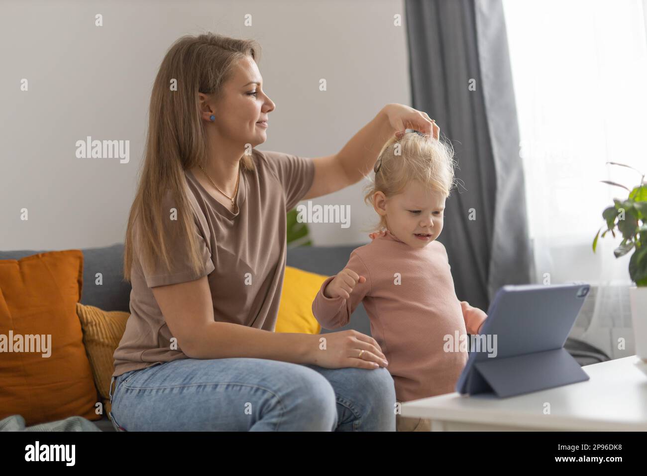 Deaf child girl with cochlear implant studying to hear sounds and have ...