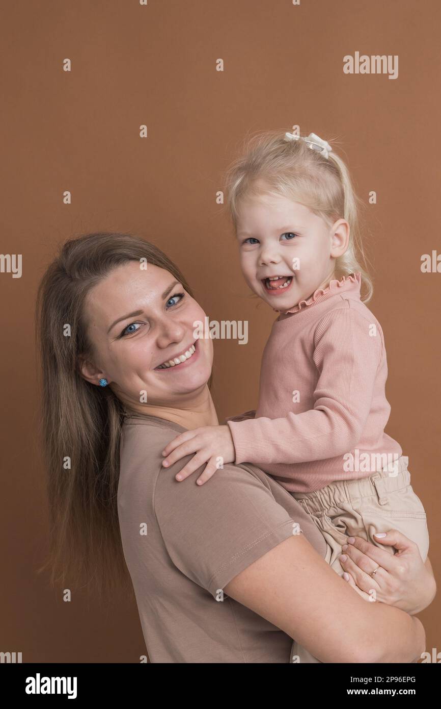 Deaf child girl with cochlear implant studying to hear sounds and have ...