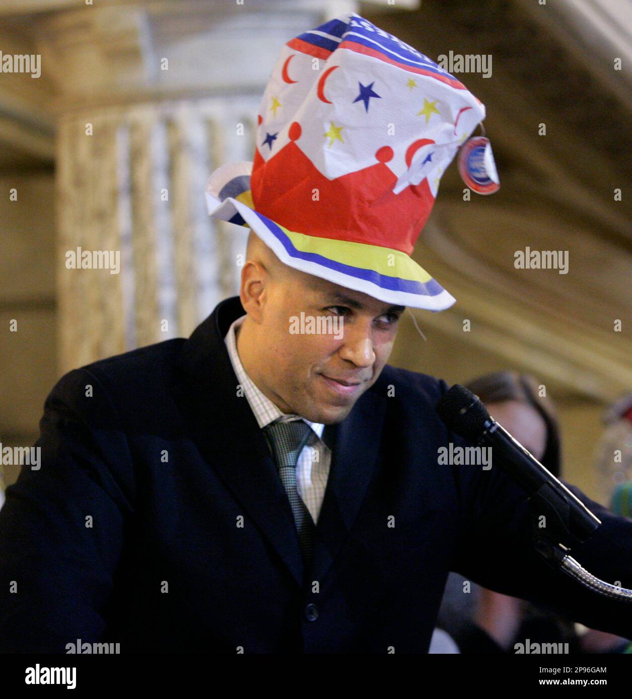Newark Mayor Cory Booker wears a circus hat during an event at City ...