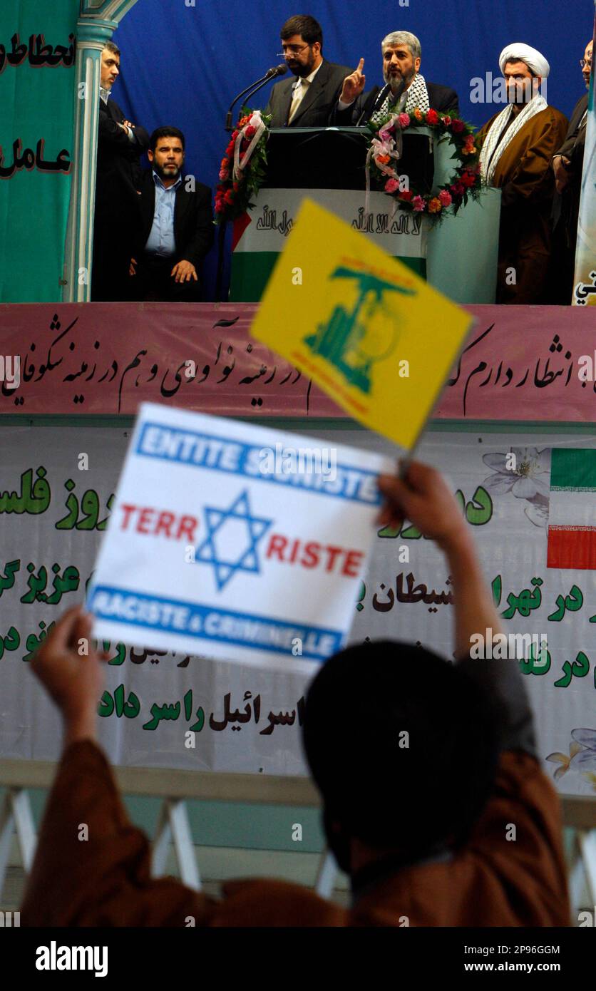 Damascus-based Hamas chief Khaled Mashaal, center right, speaks at ...