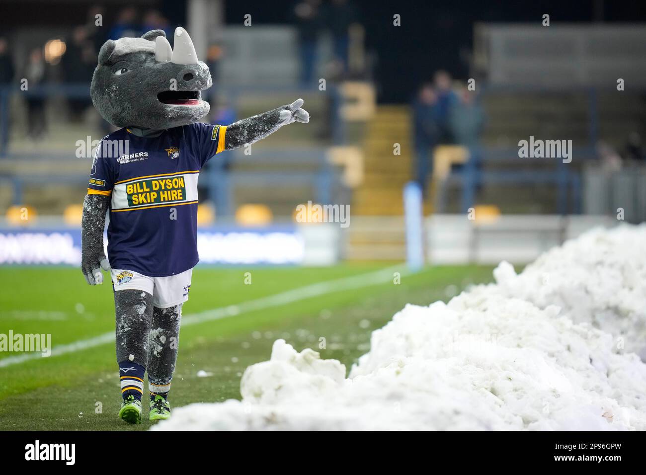 Leeds Rhinos mascot Ronnie Rhino gestures to the fans before the ...