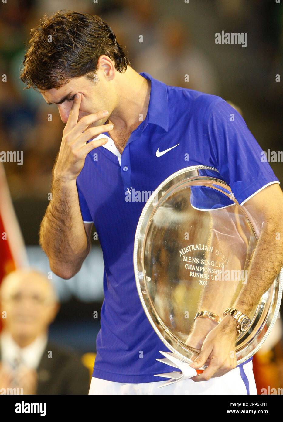 Switzerland's Roger Federer cries after receiving his Men's singles ...