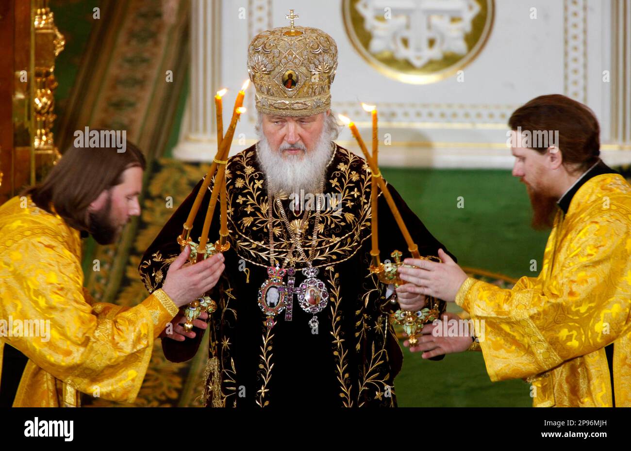 The new Russian Orthodox Patriarch Kirill, center, conducts a service ...