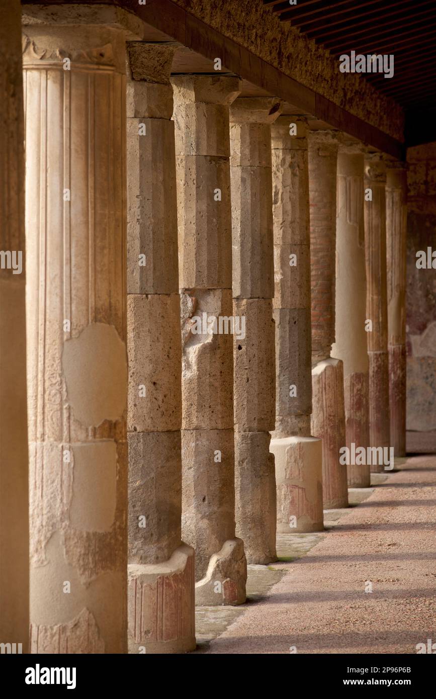 Collonade. Stone columns, Pompeii, Naples, Italy Pompeii was buried ...