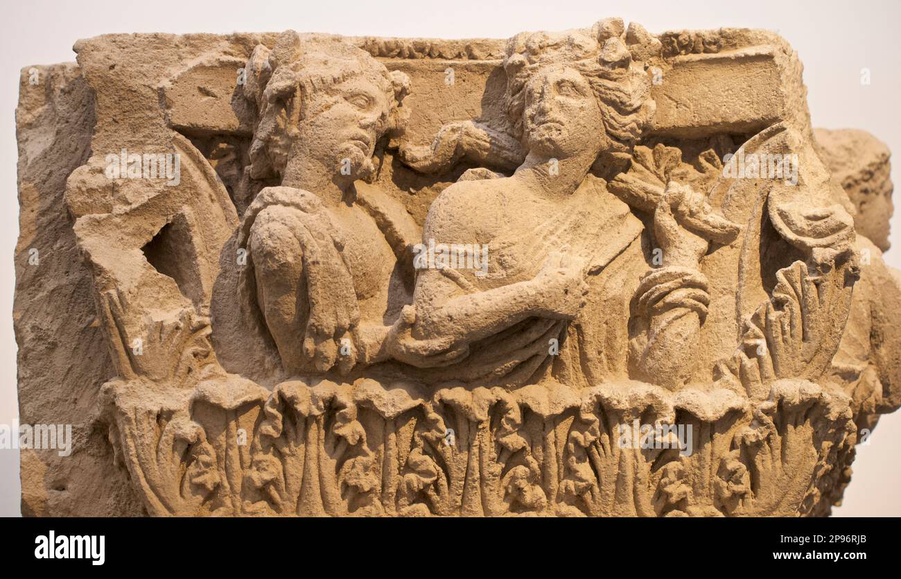 Ornately carved Roman tufa stone capital from Pompeii depicting married ...