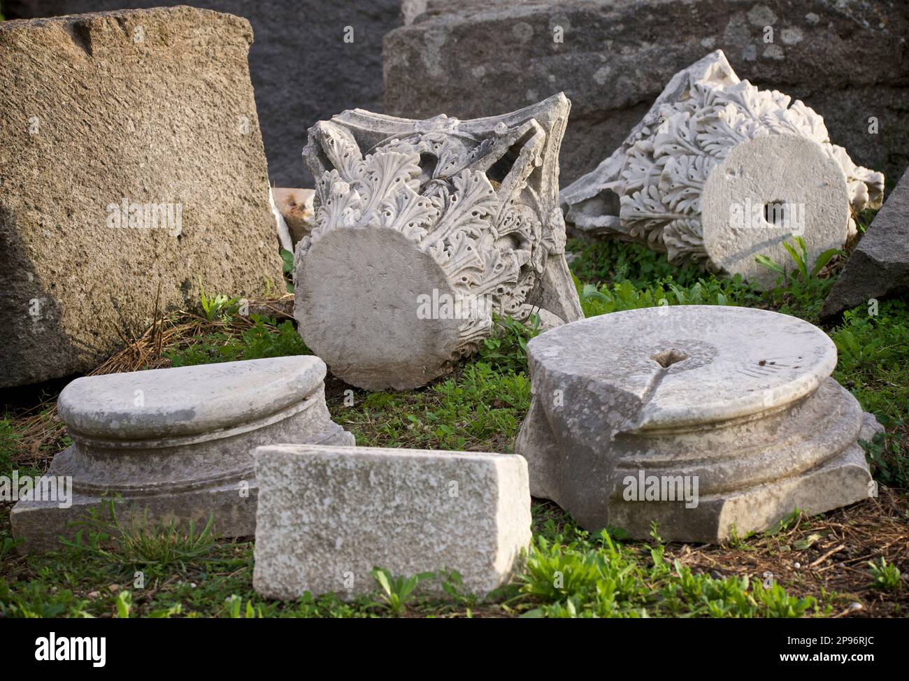 Scattered stone column bases and capitals at Pompeii, Naples, italy ...