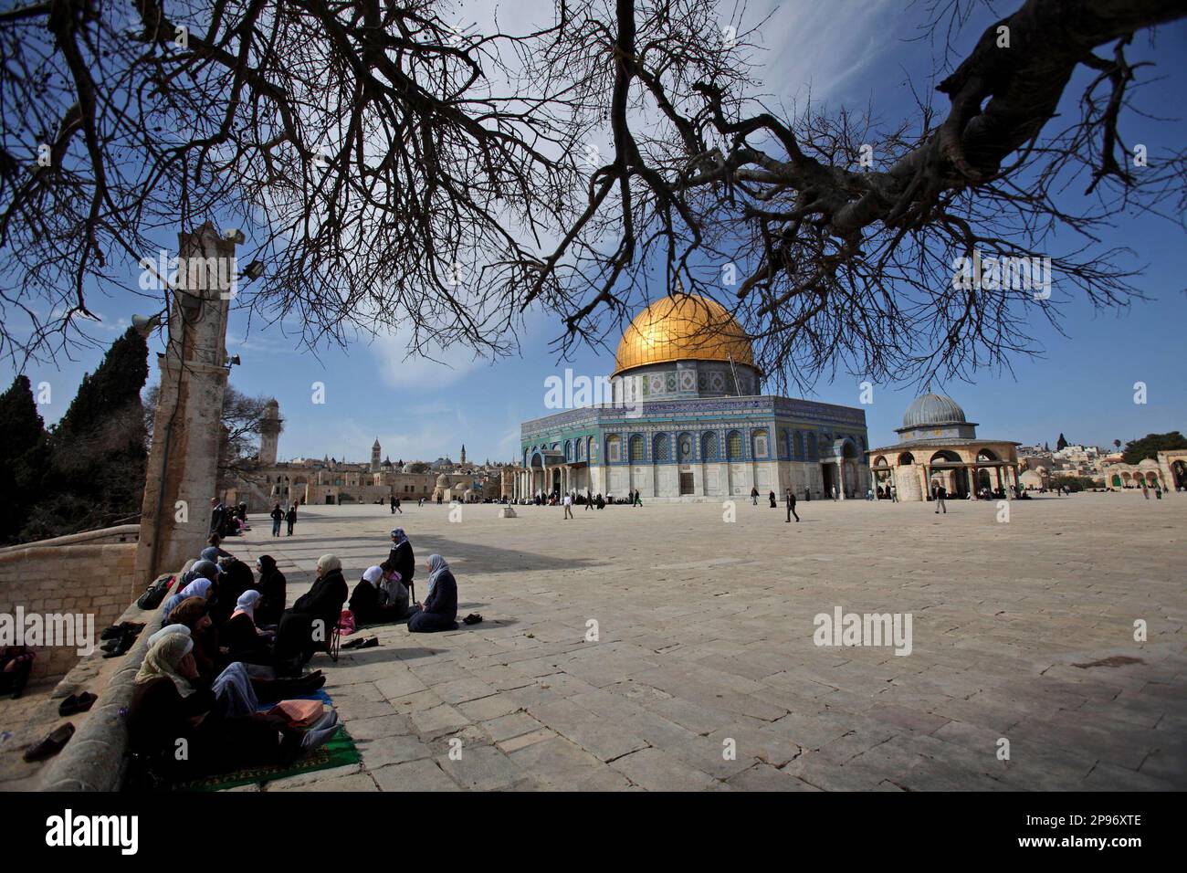 The Dome of the Rock Mosque is seen in the background as Palestinian ...