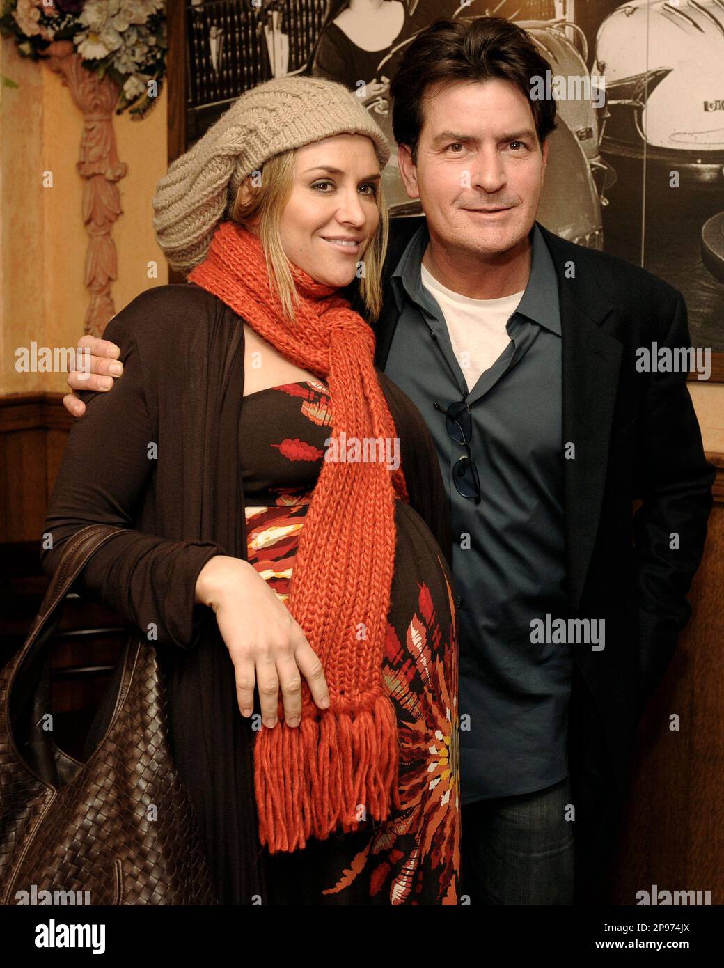 Actor Charlie Sheen and his wife Brooke Allen pose at an event to ...