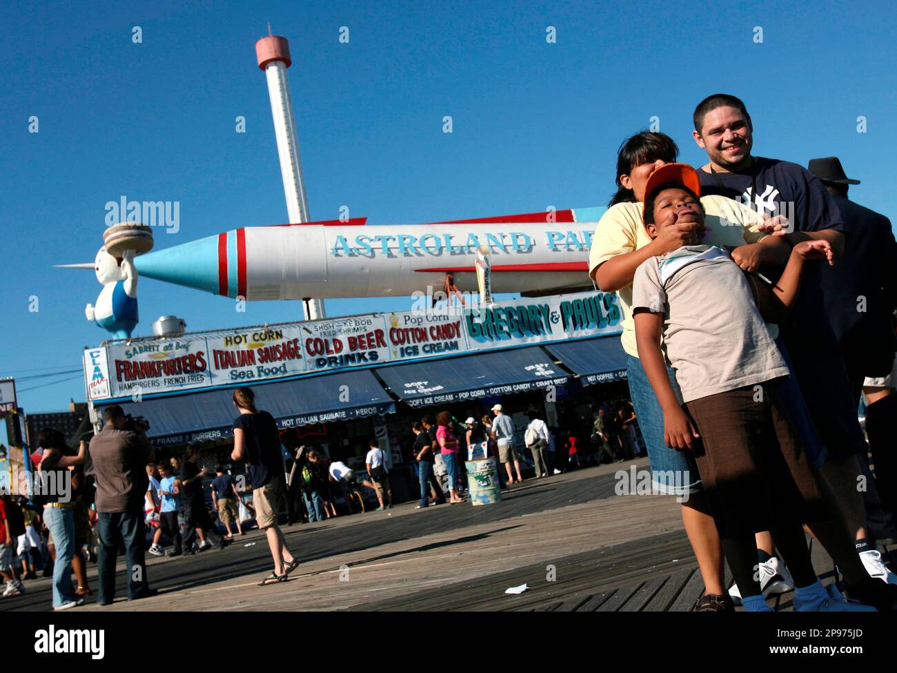 **FILE**In this Sept. 7, 2008 file photo, a family poses in front of ...