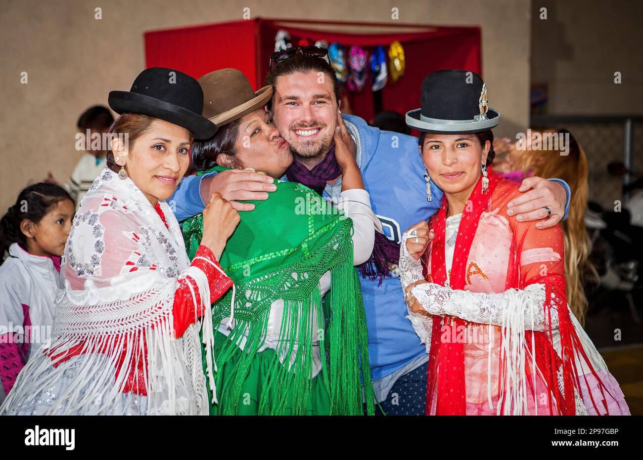 Lucha Libre. After the show. A follower is photographed with cholitas ...