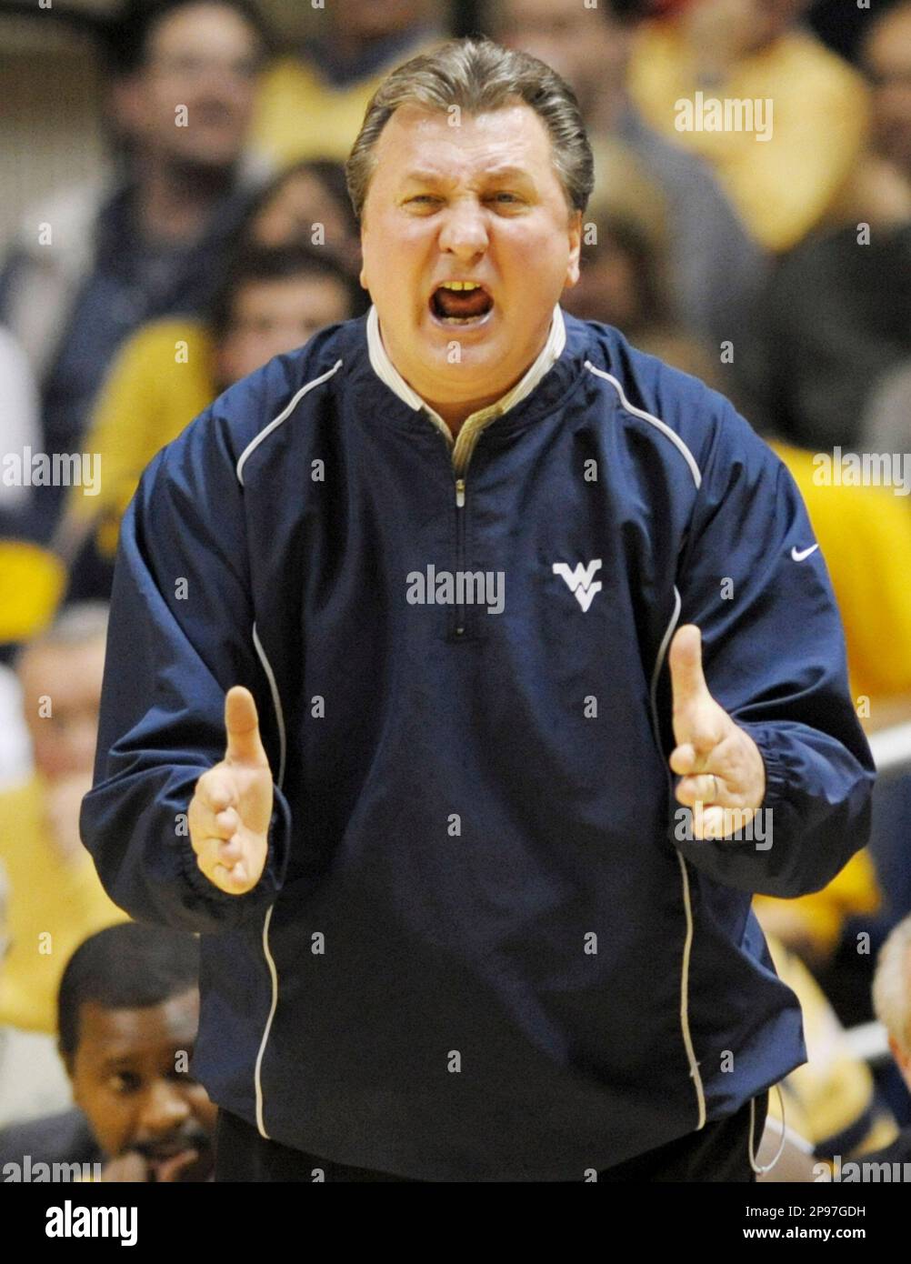 West Virginia head coach Bob Huggins yells to his team against ...