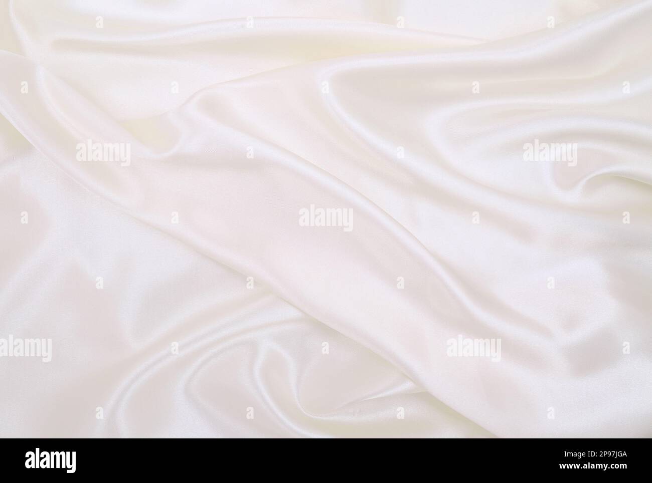 Smooth elegant white silk or satin luxury cloth texture can use as ...
