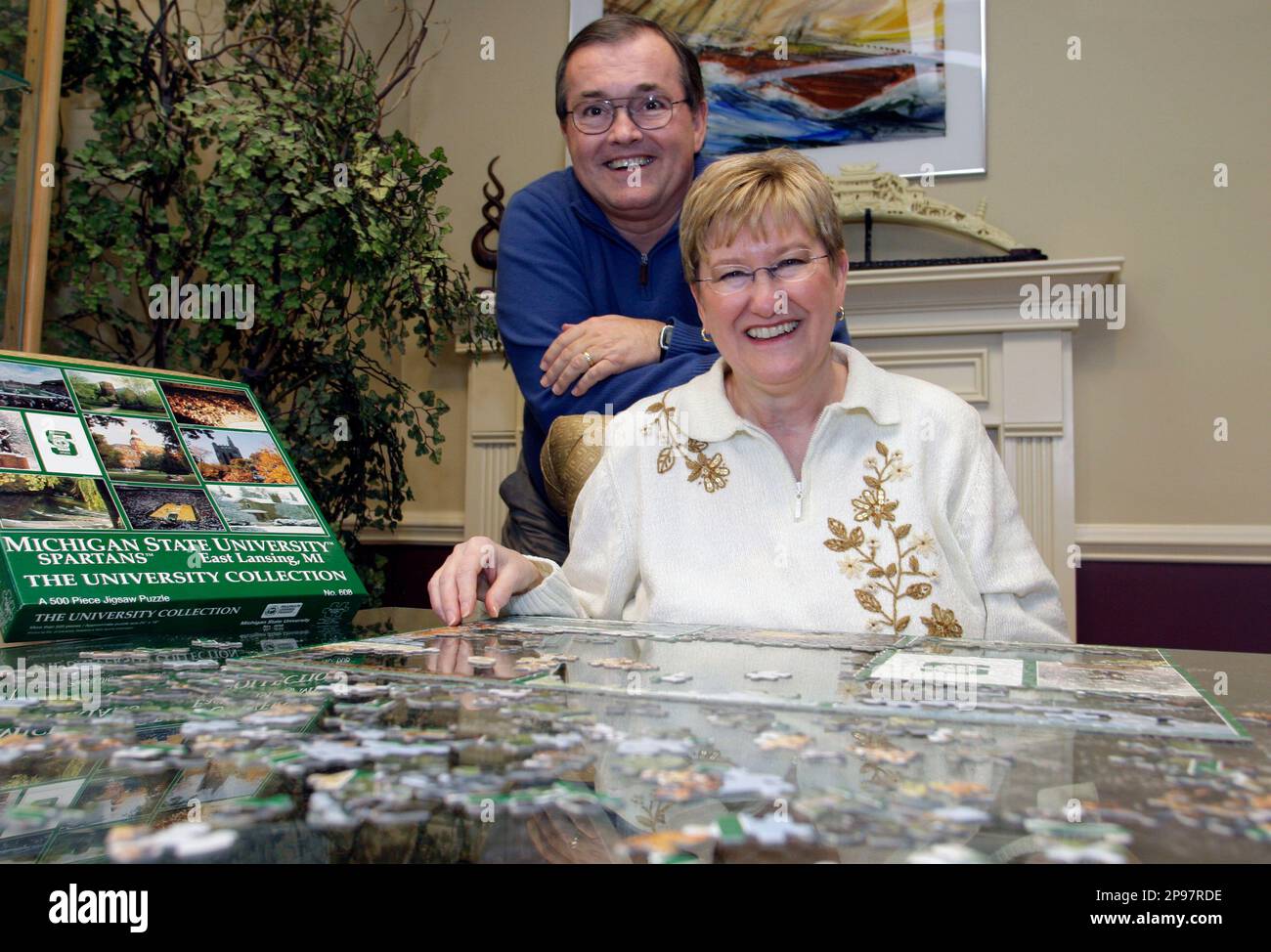 Beverly Mills, front, and her husband Michael, back, are shown at their ...