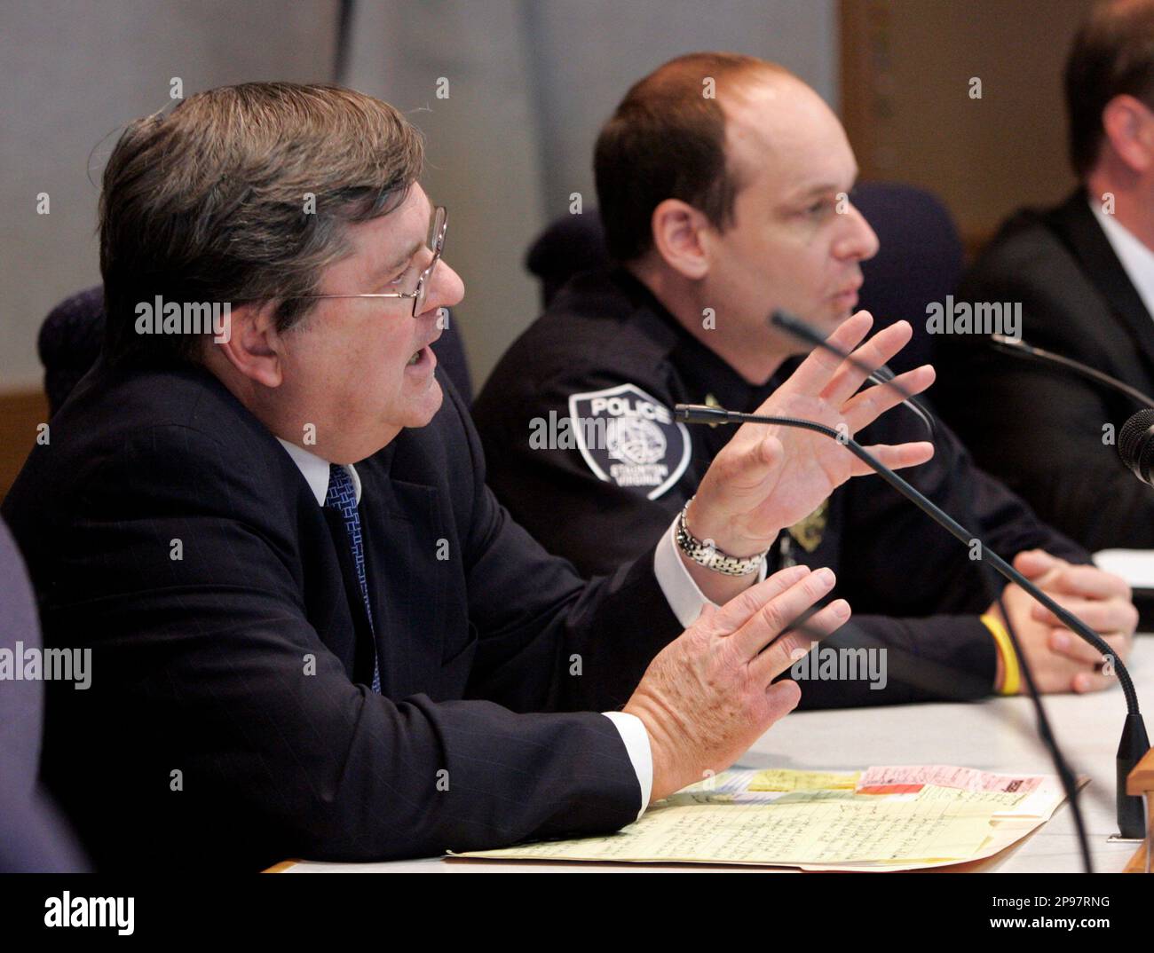 Commonwealth Attorney Raymond Robertson gestures during a press ...