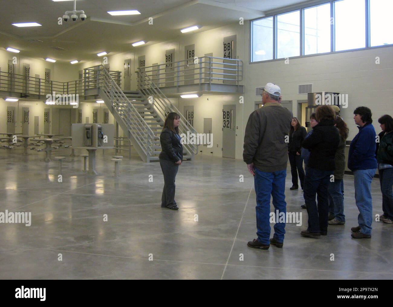 Michelle Duncan, left, a correctional unit supervisor, leads a tour ...