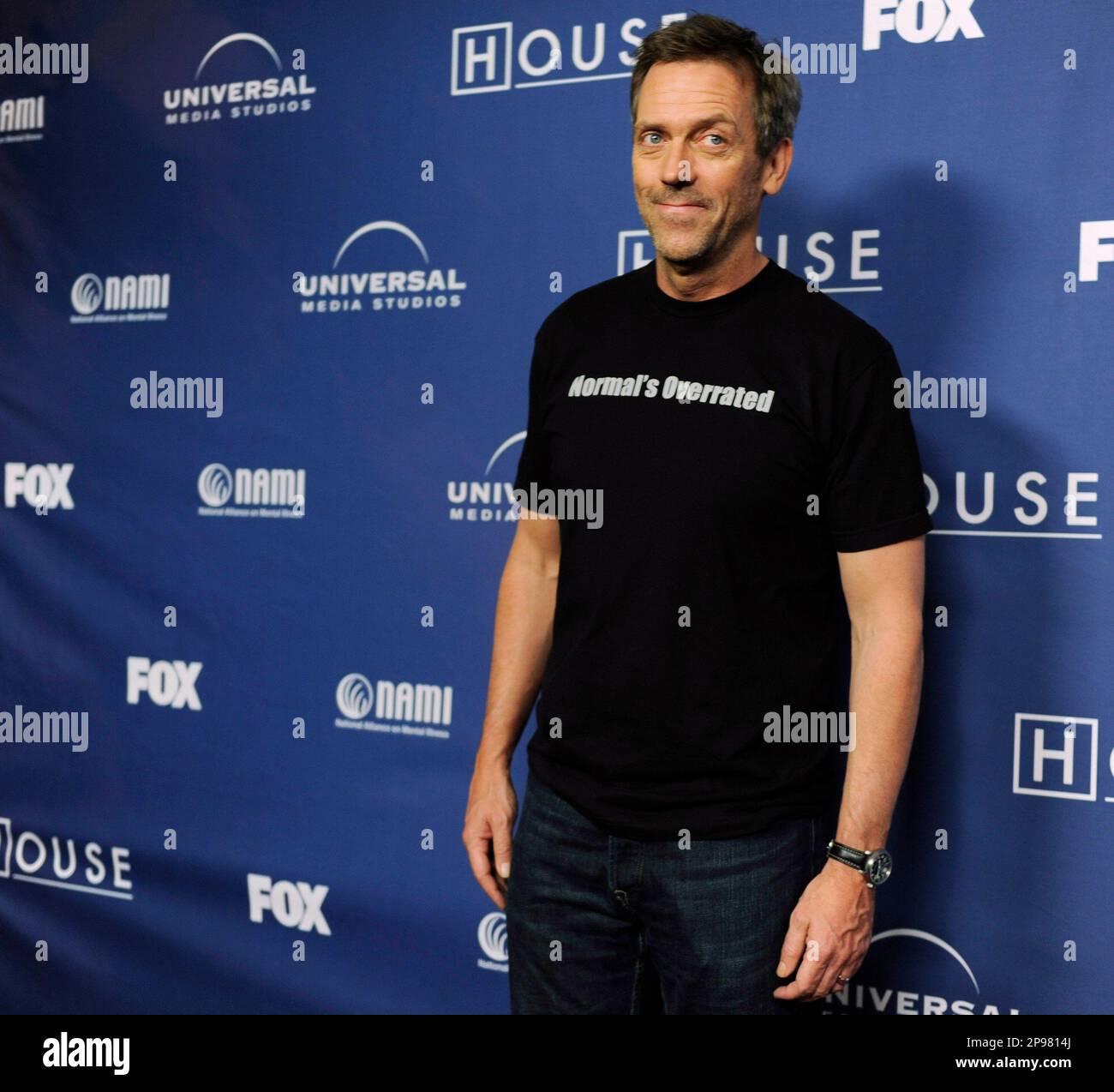 Hugh Laurie, star of the television series "House," arrives at a party ...