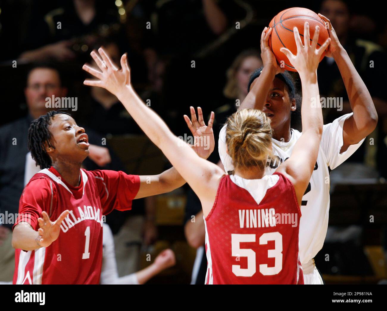 Colorado forward Brittany Spears (22) is pressured by Oklahoma's Jenny ...