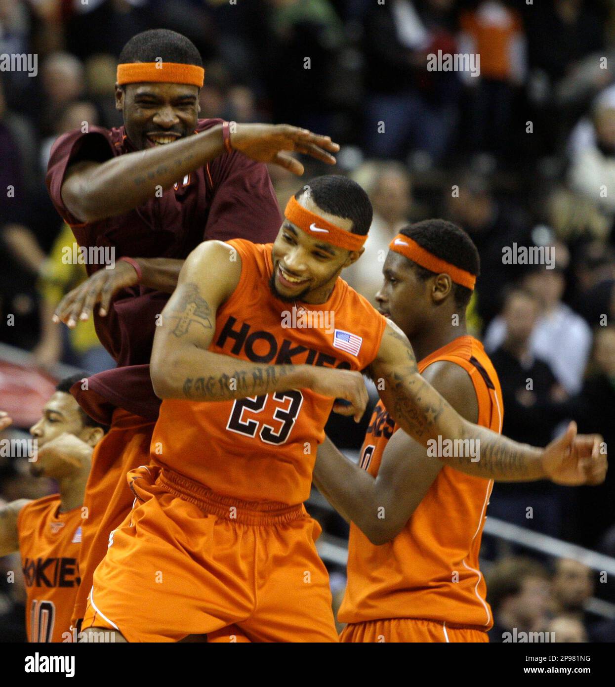 Virginia Tech players Malcolm Delaney (23) and Paul Debnam, top ...