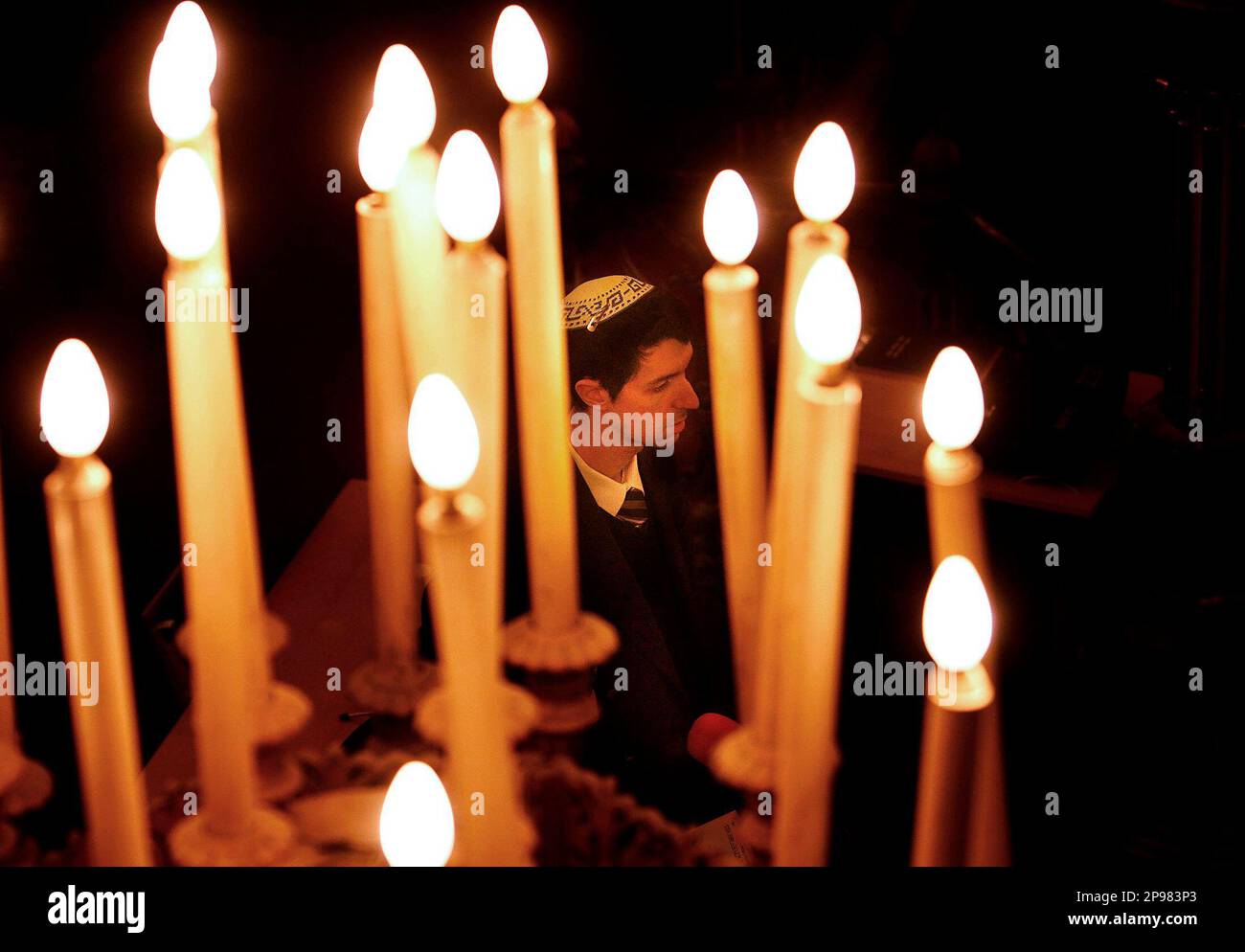 Shlomo Sorin Rosen, Rabbi of the Romanian Jewish community, reads a ...