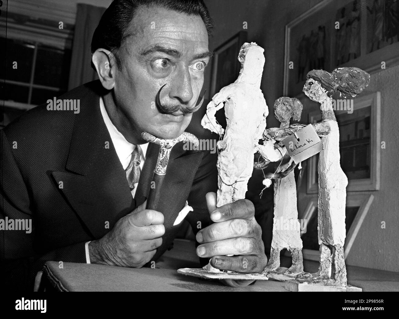 ** FILE ** Resting his chin on the handle of his cane, Spanish ...