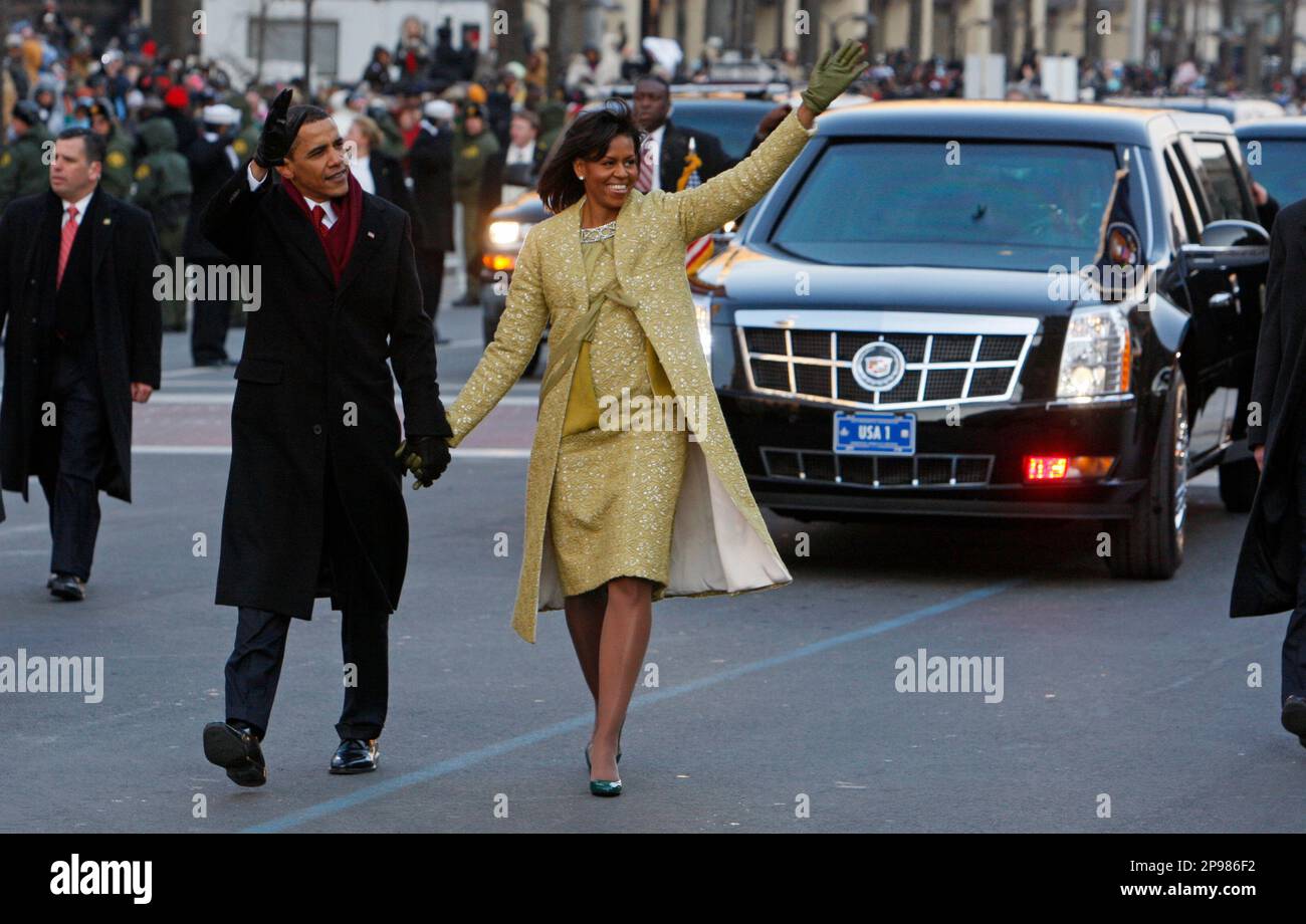 President Barack Obama and first lady Michelle Obama walk the inaugural ...