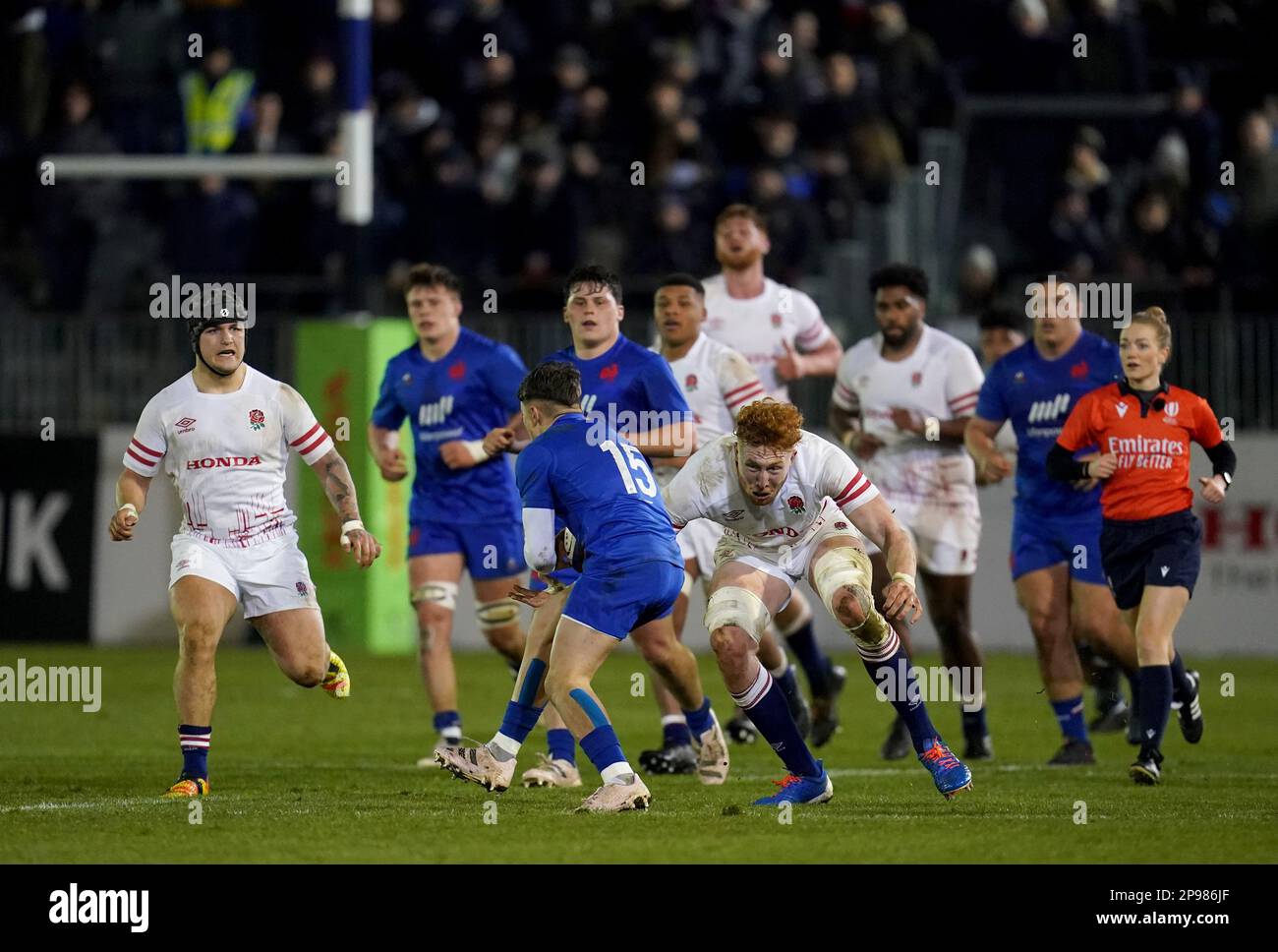England’s Lewis Chessum makes a tackle on France’s Mathis Ferte during ...