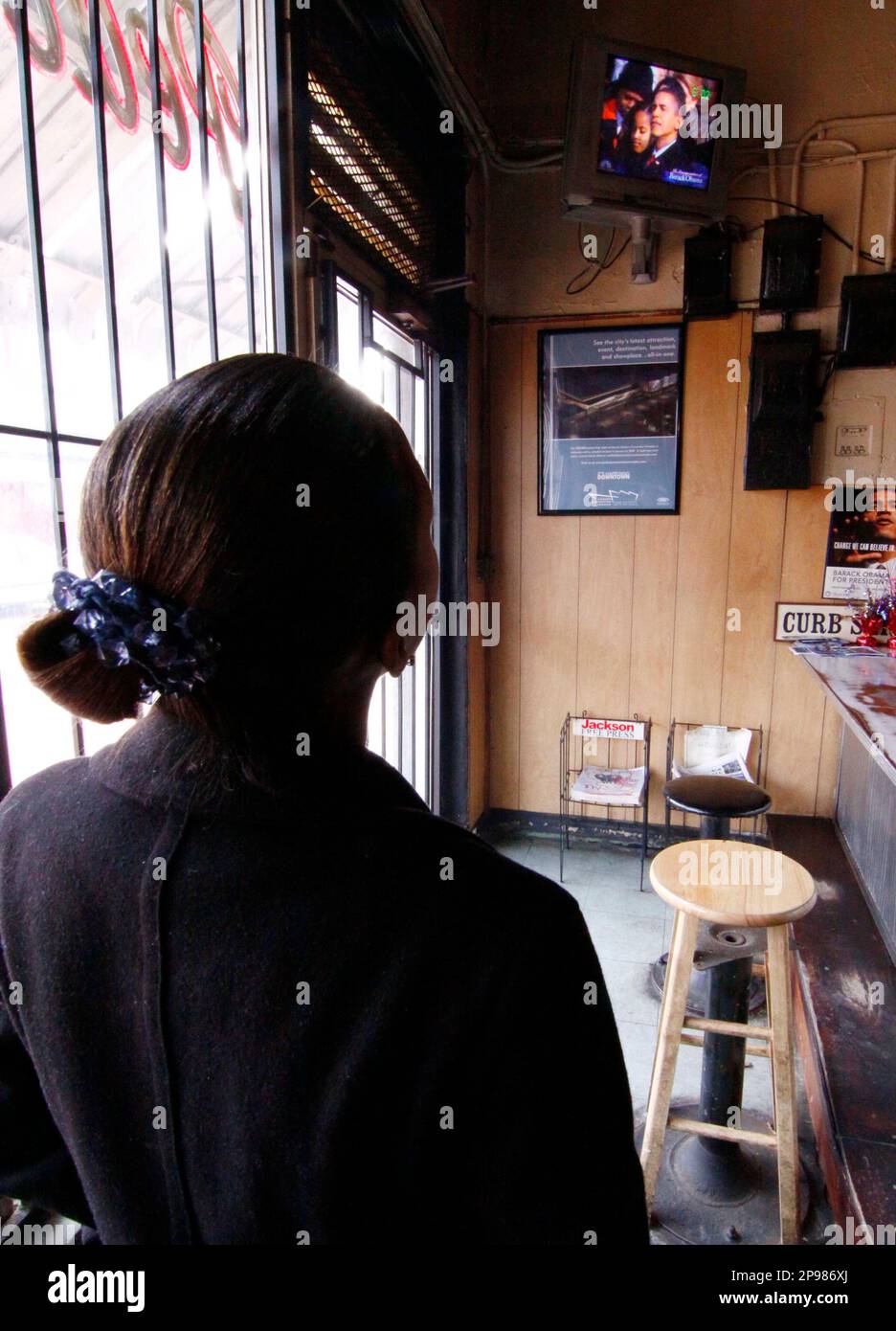 Tamika Wolfe watches the inauguration of President Barack Obama ...