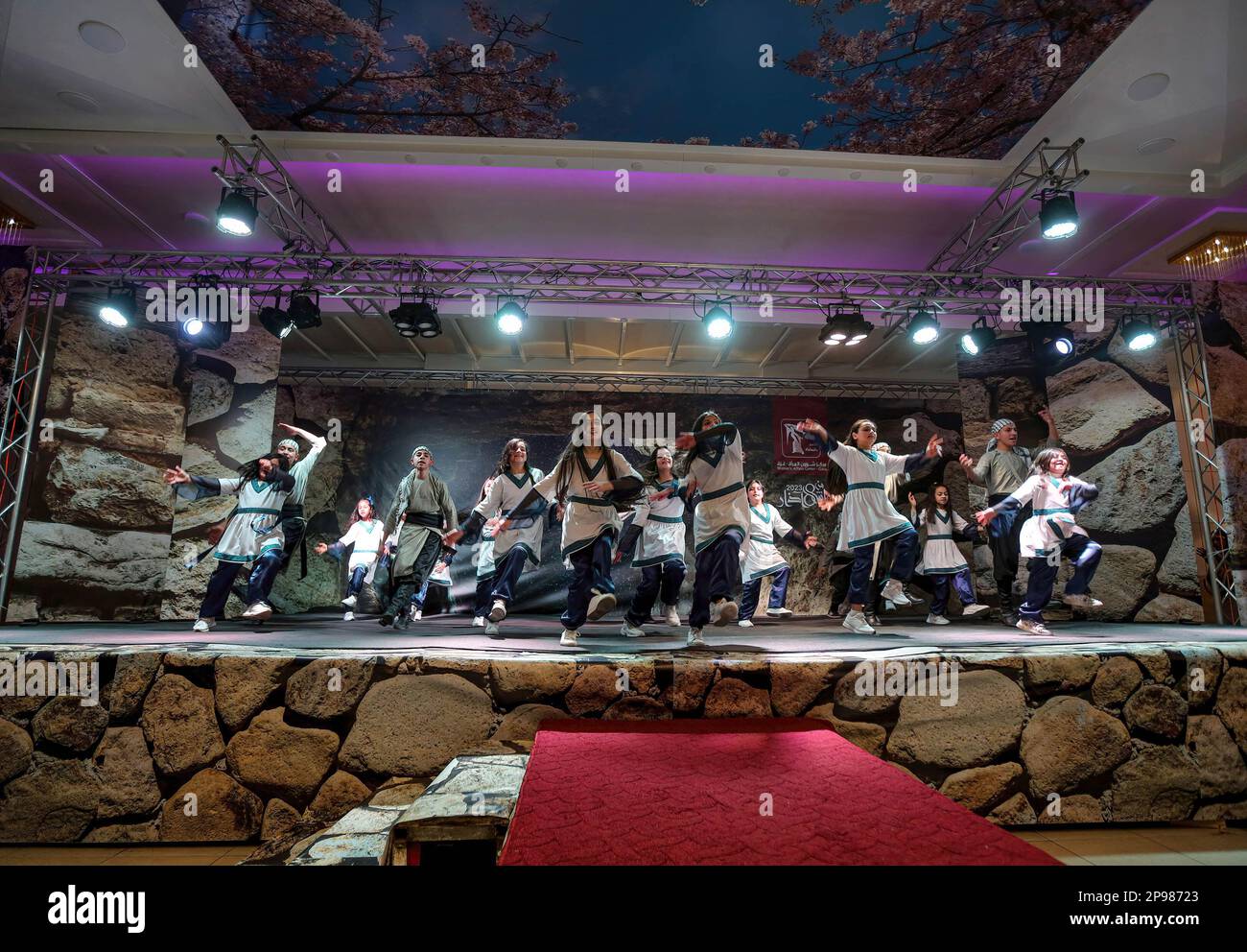 Palestinian girls perform Dabkeh dance during a celebration of ...