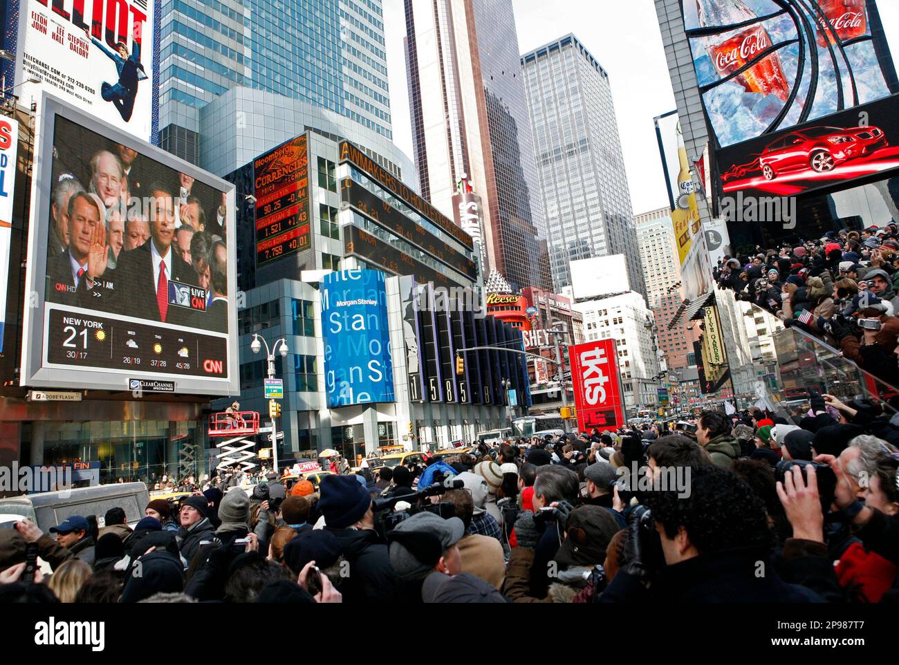 Spectators in Times Square watch President Barack Obama take the oath ...
