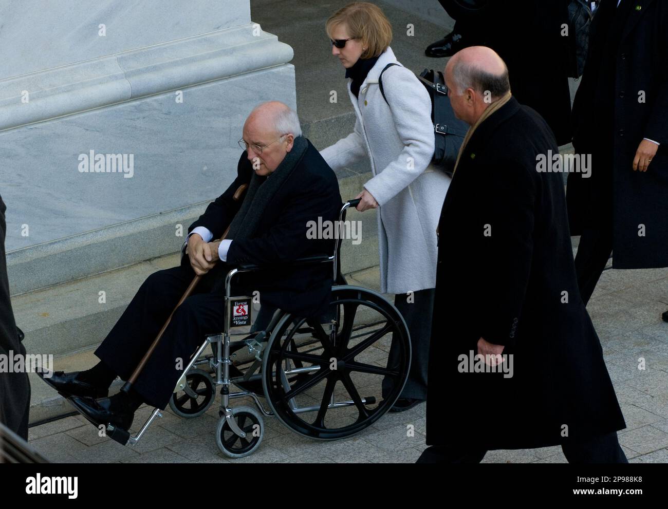 Vice President Dick Cheney arrives in a wheelchair at the U.S. Capitol ...